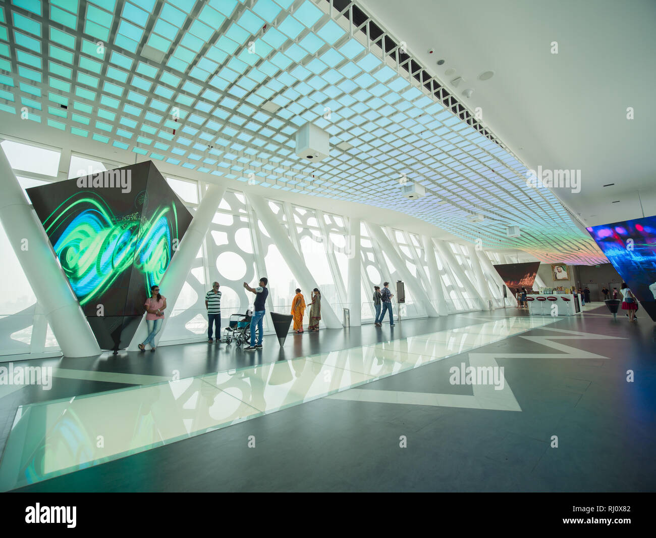 Dubai, UAE - May 15, 2018: The interior of the building with visitors ...