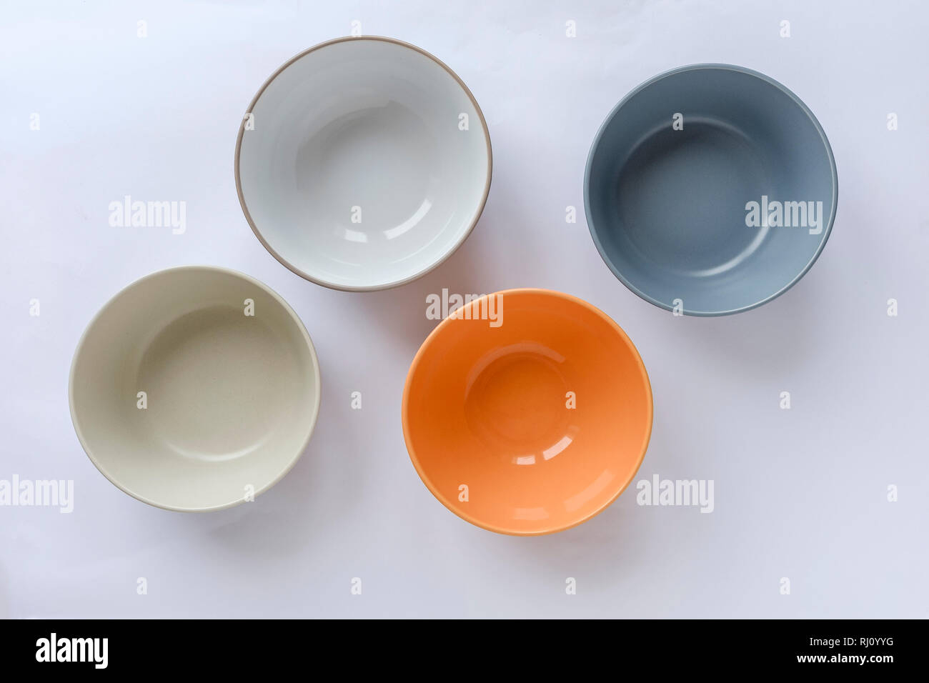 Assorted clean empty bowls and plates for food viewed from above as a ...