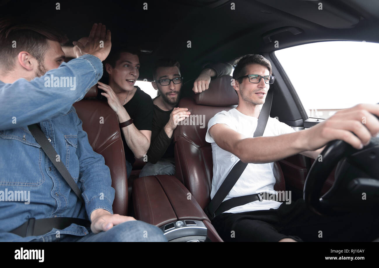 close up.happy friends talking in the car Stock Photo - Alamy