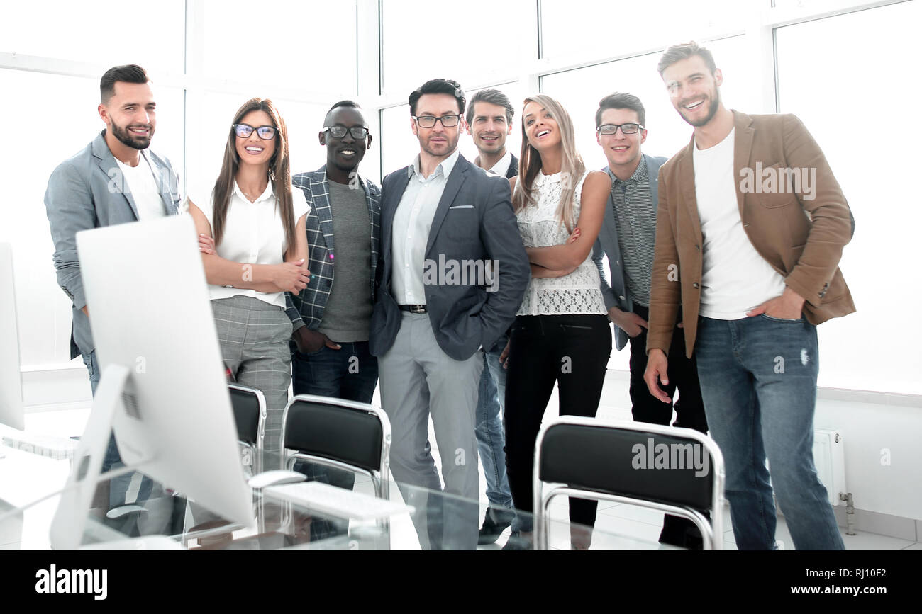 multinational business team standing in a bright office Stock Photo - Alamy