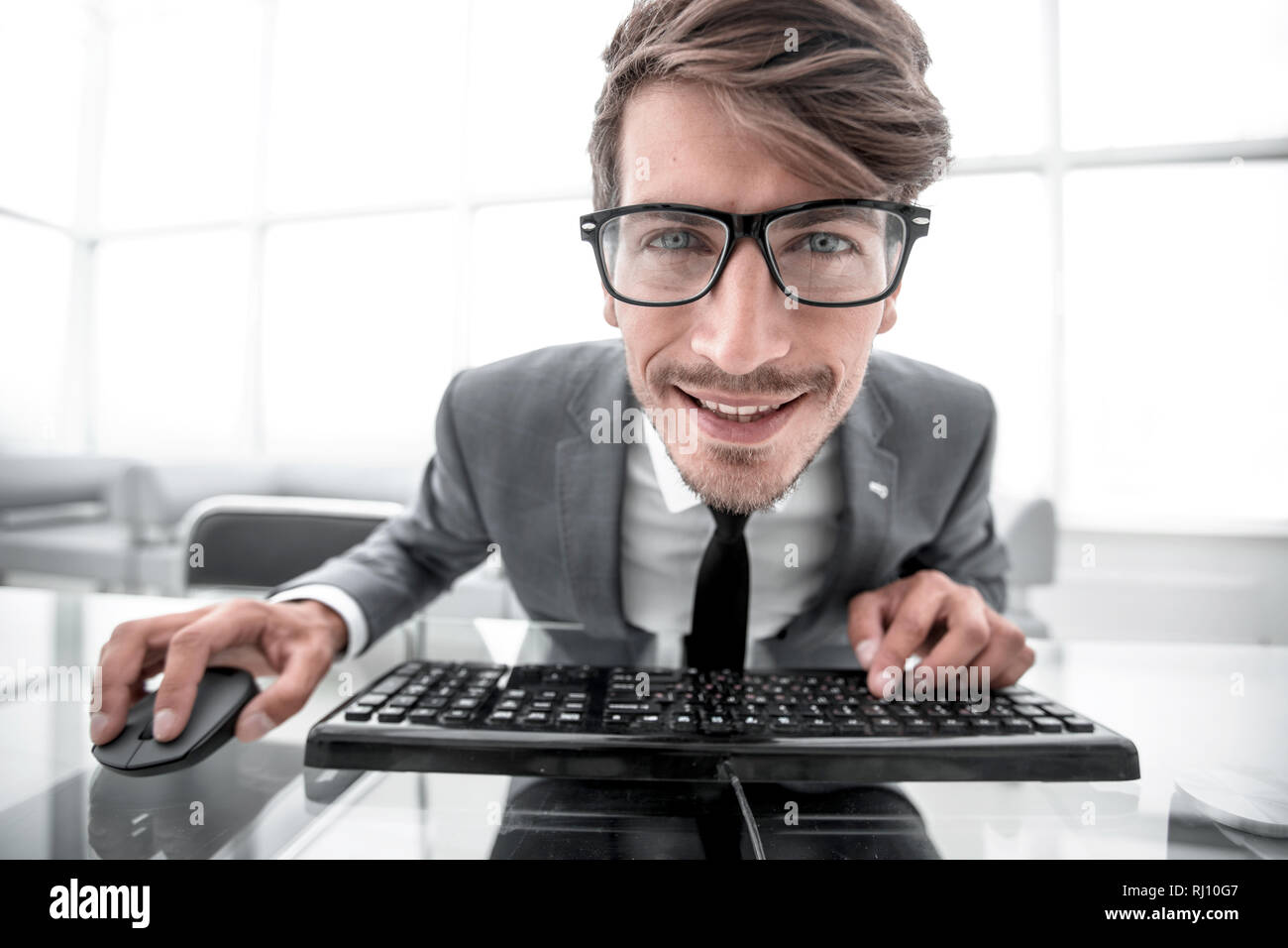 Computer geek typing on keyboard hi-res stock photography and images ...