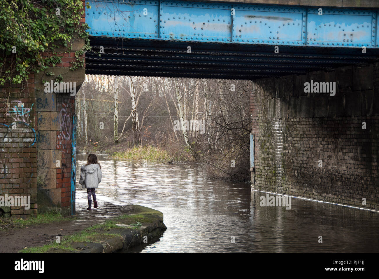 Sheffield, UK – January 24 2016 : A young girl walks beneath Pothouse ...