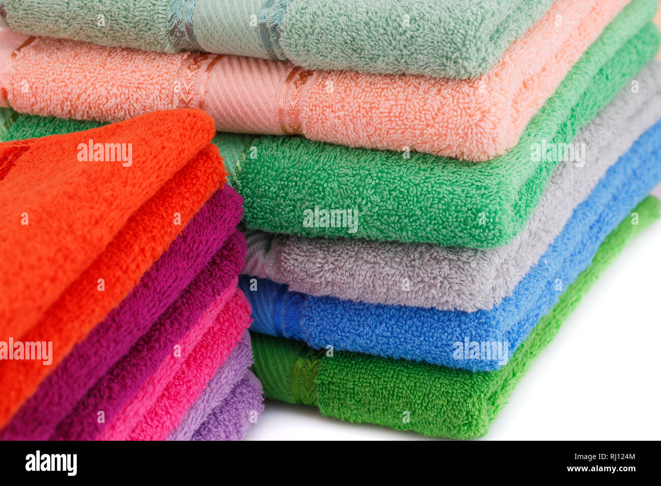 Colorful towels stack closeup picture Stock Photo - Alamy