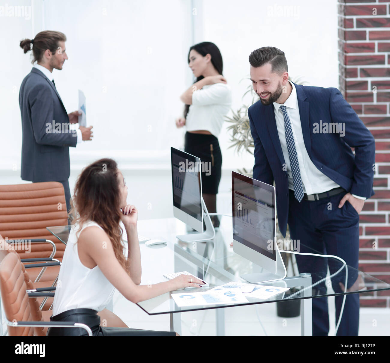 employees in the workplace in the office Stock Photo - Alamy