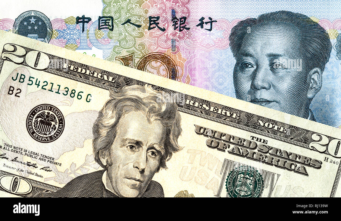Chinese yuan banknote and american dollar. Concept trade war and ...