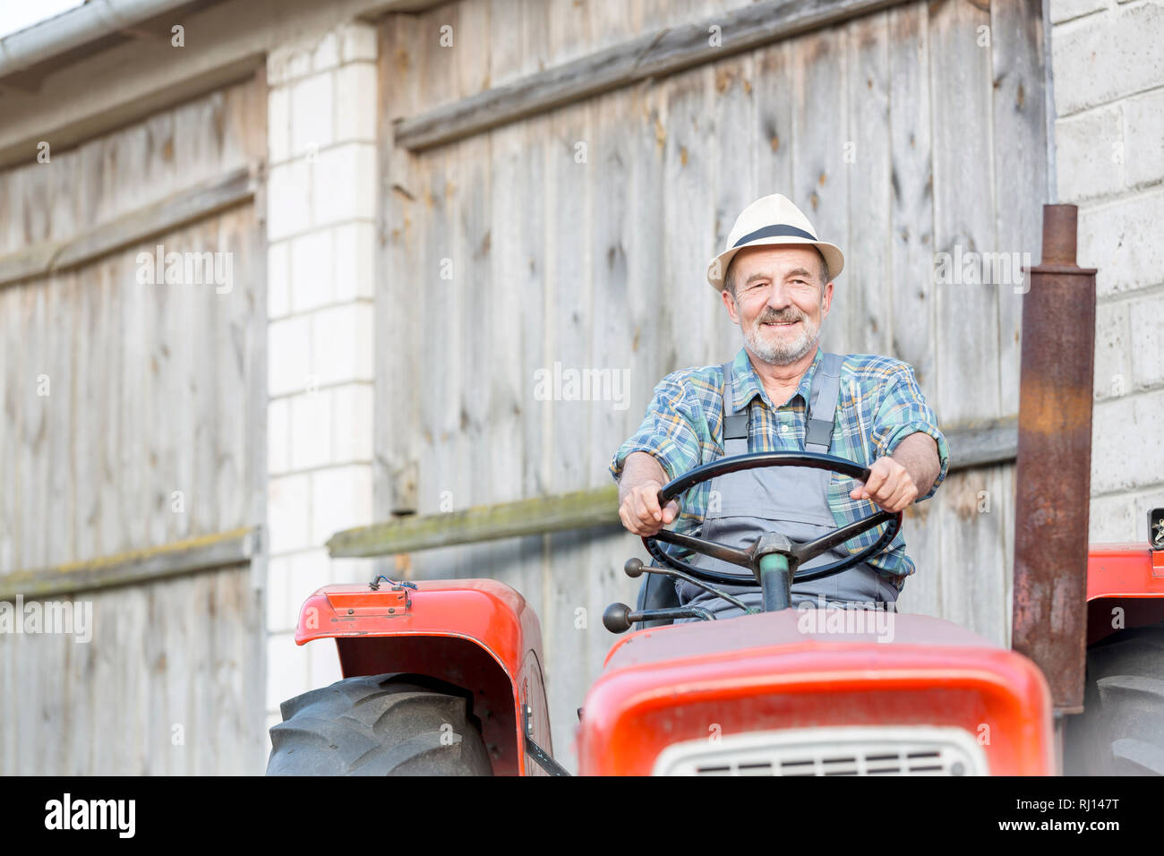 Farmer portrait tractor hi-res stock photography and images - Alamy