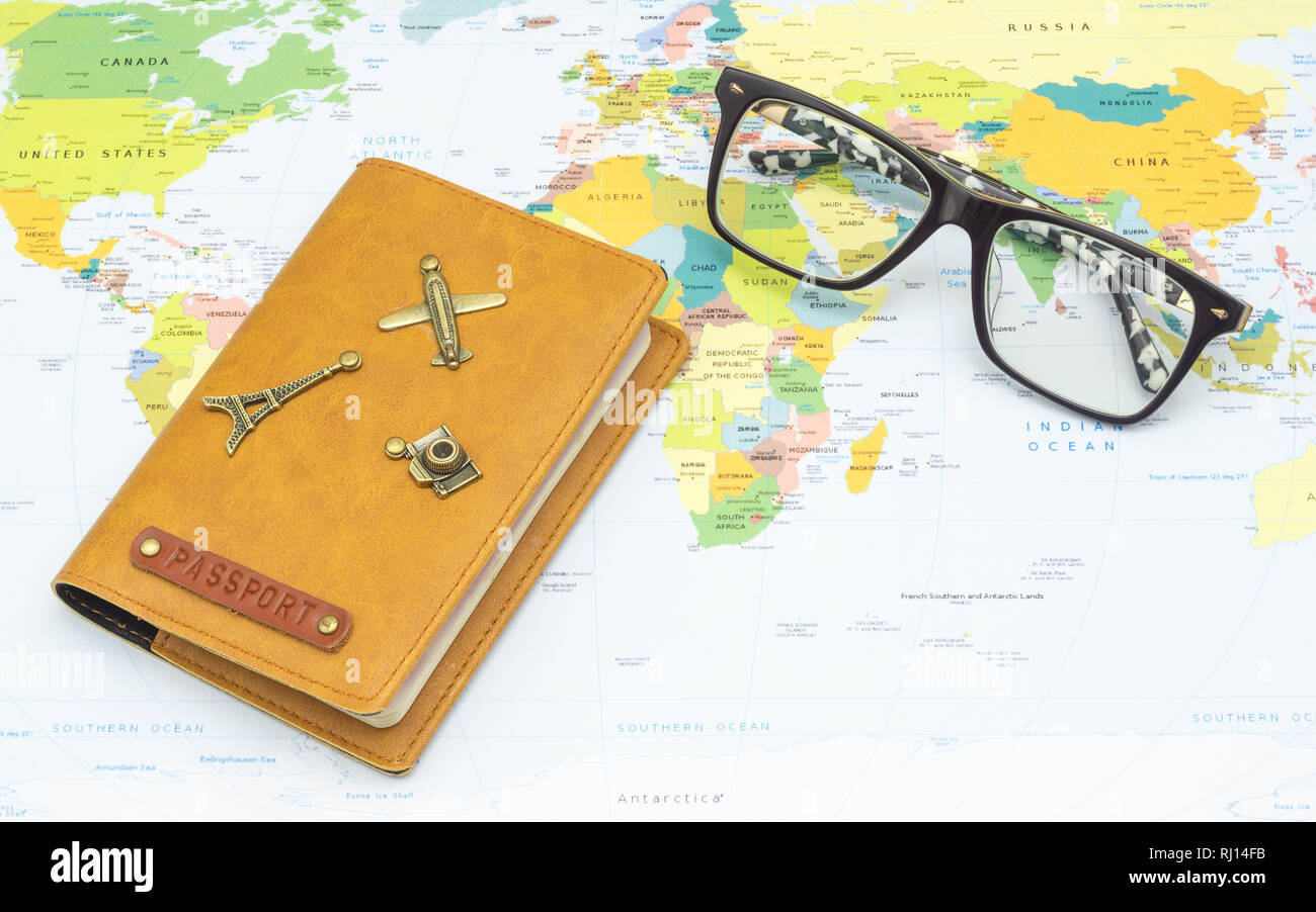 Travel Planning concept. Passport in cover with travel items decoration ...