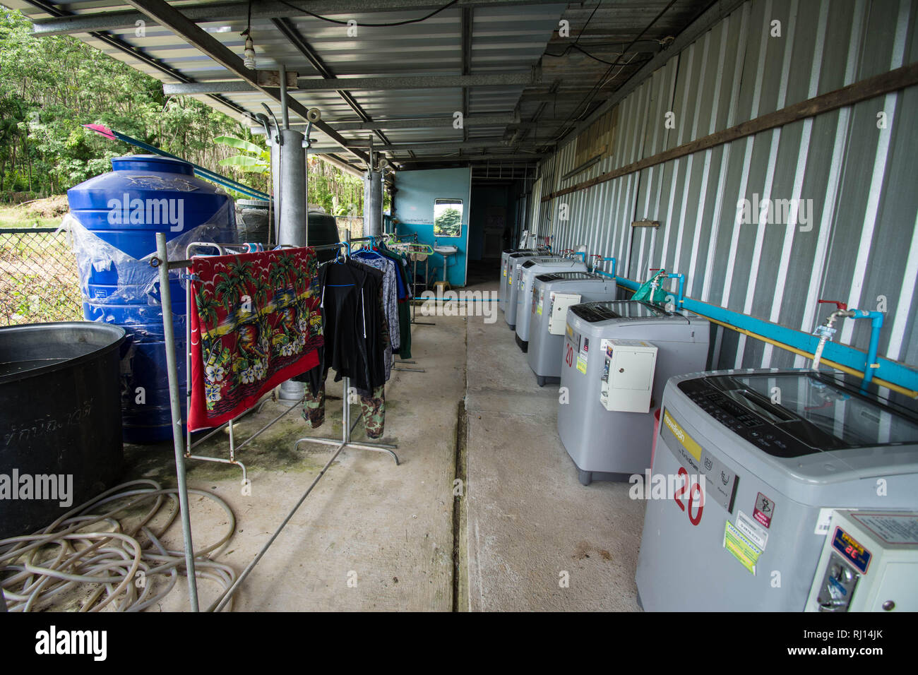 Washing machine laundry launderette towel rail machines blanket red ...