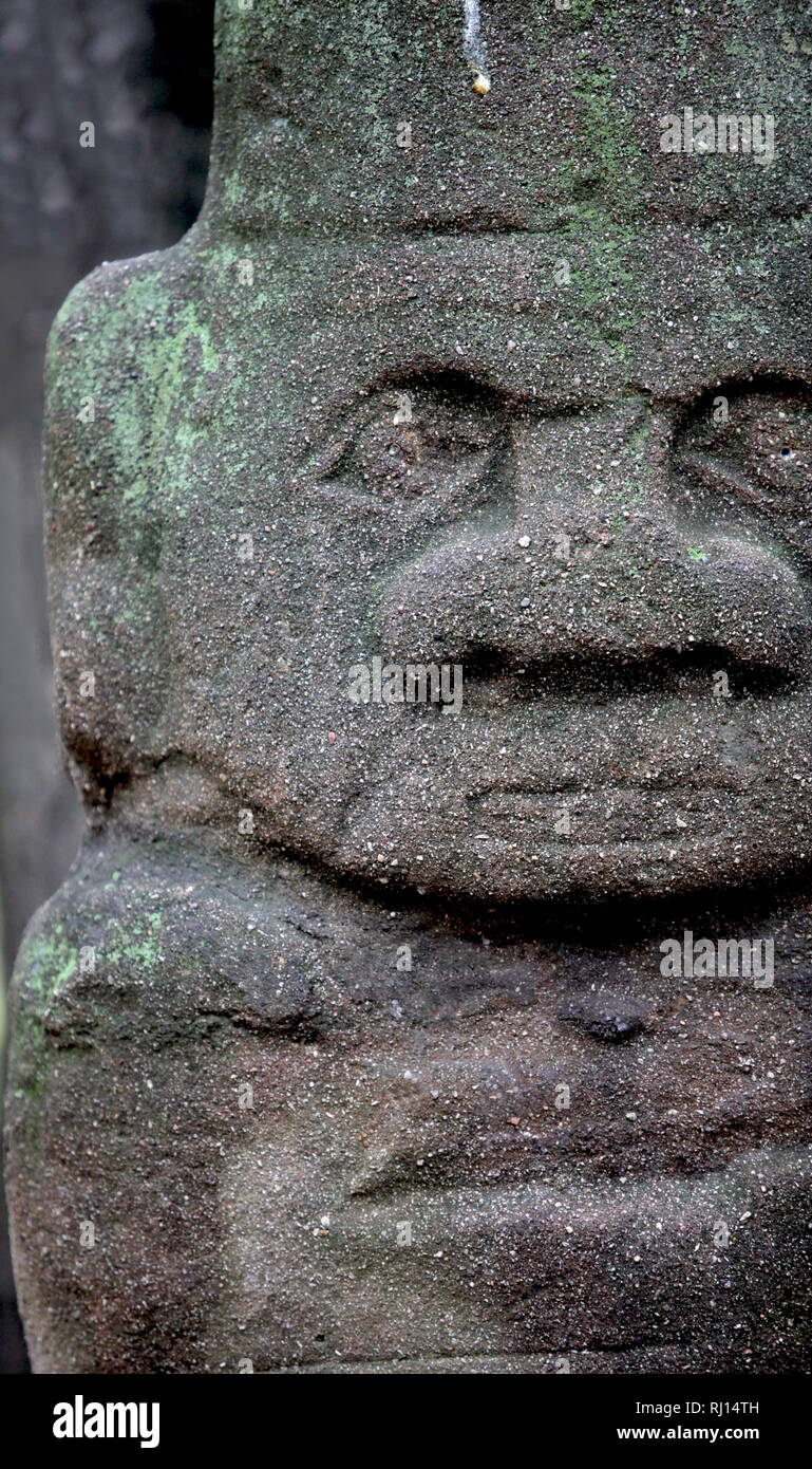 Old stone idol close to Stock Photo - Alamy