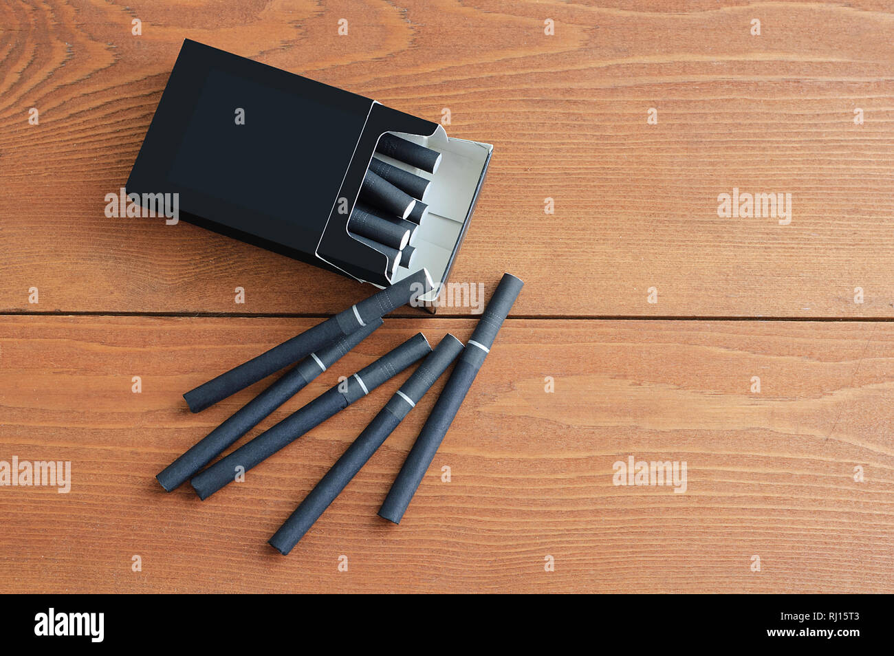Brown cigarettes hi-res stock photography and images - Alamy