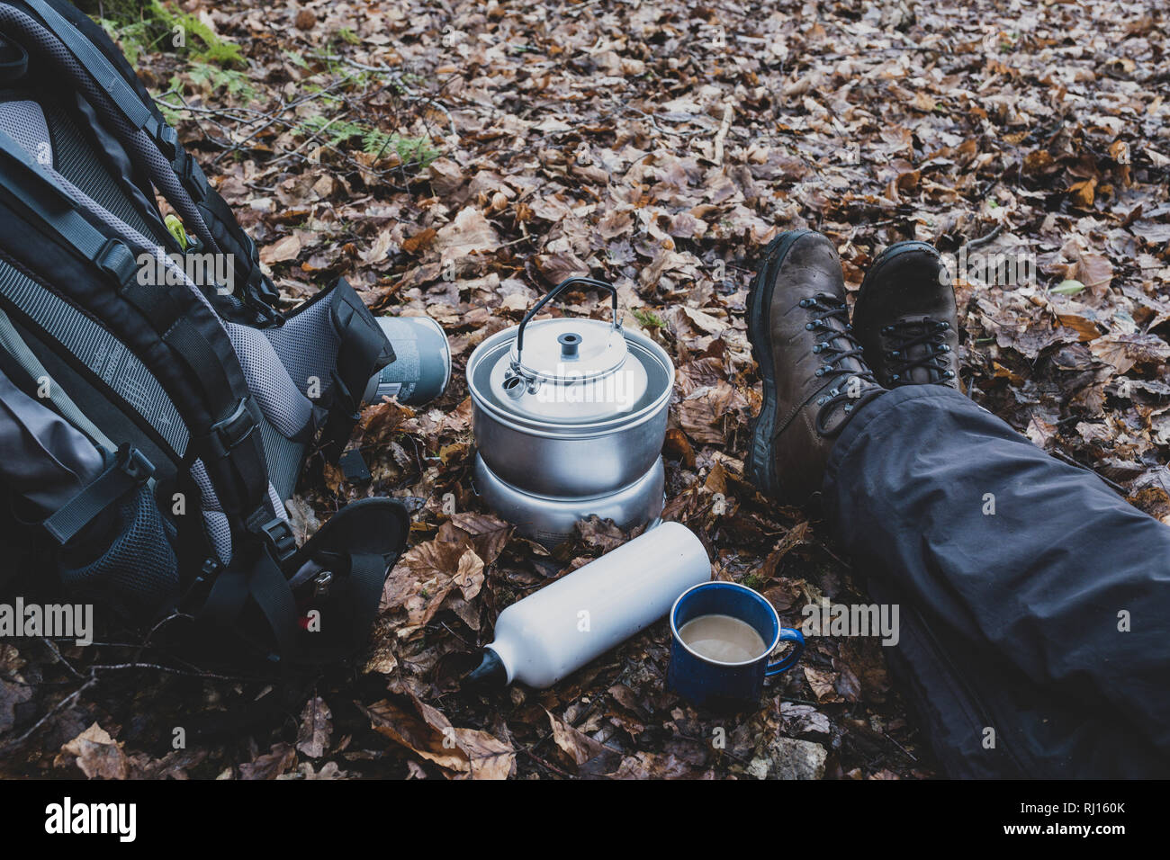 A man sitting in the woods Stock Photo - Alamy