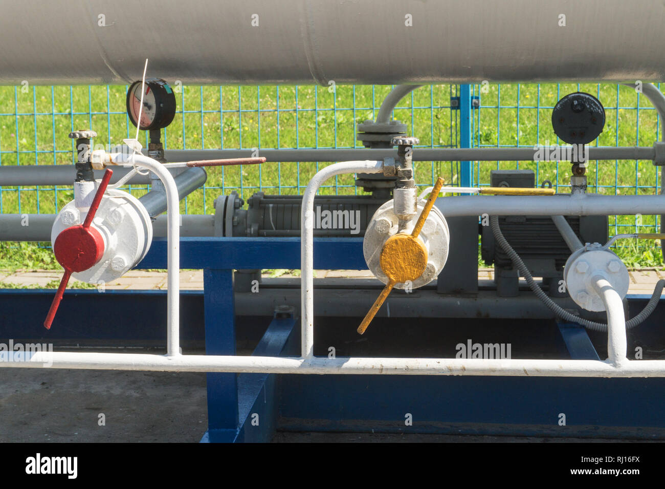 Gas taps and pressure gauges on the gas station pipeline Stock Photo ...