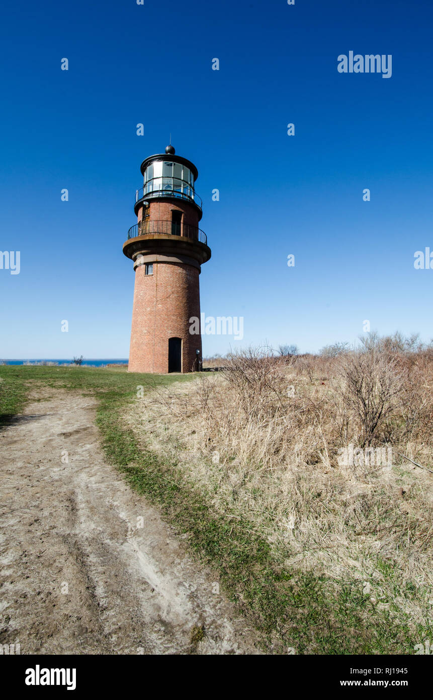 Aquinnah Head view with Gay Head Lighthouse on Cape Cod on a sunny day ...