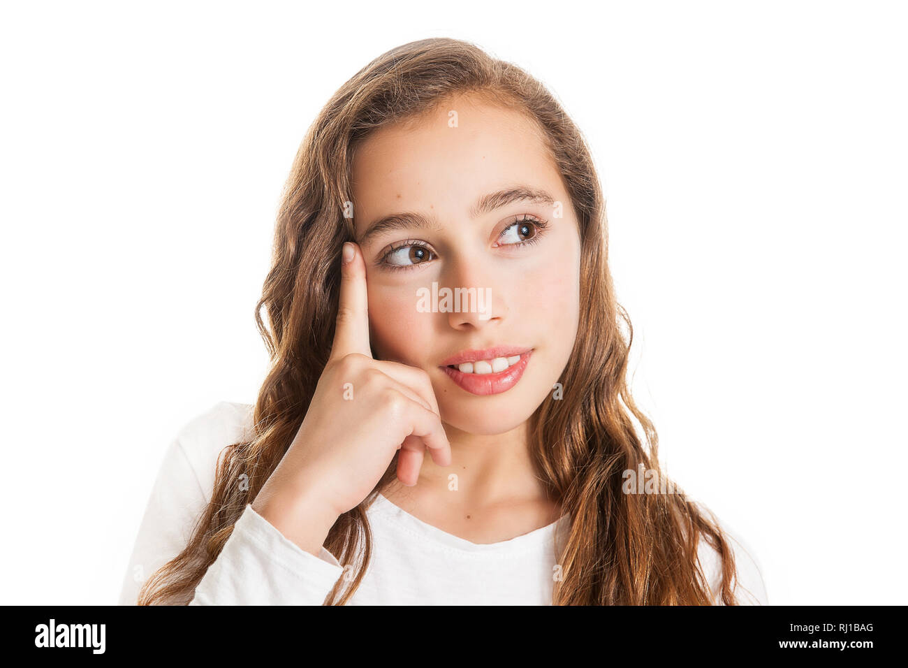 Beautiful young girl thinking or having an idea isolated on white ...