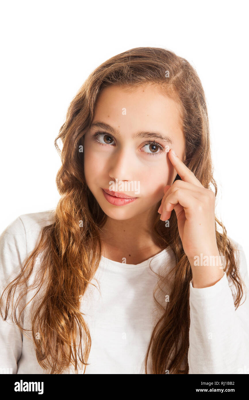 Beautiful young girl thinking or having an idea isolated on white ...