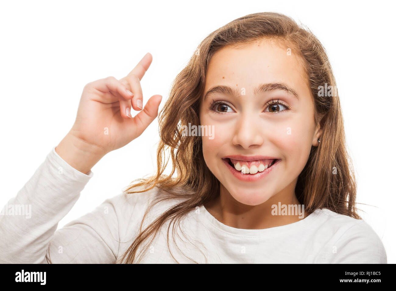 Beautiful young girl thinking or having an idea isolated on white ...