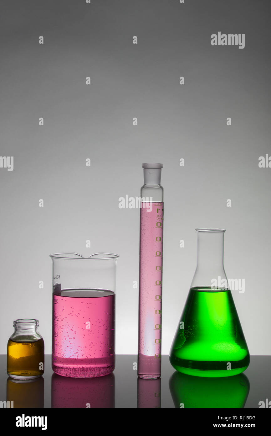 Liquid in laboratory bottles. Scientific biochemical laboratory ...