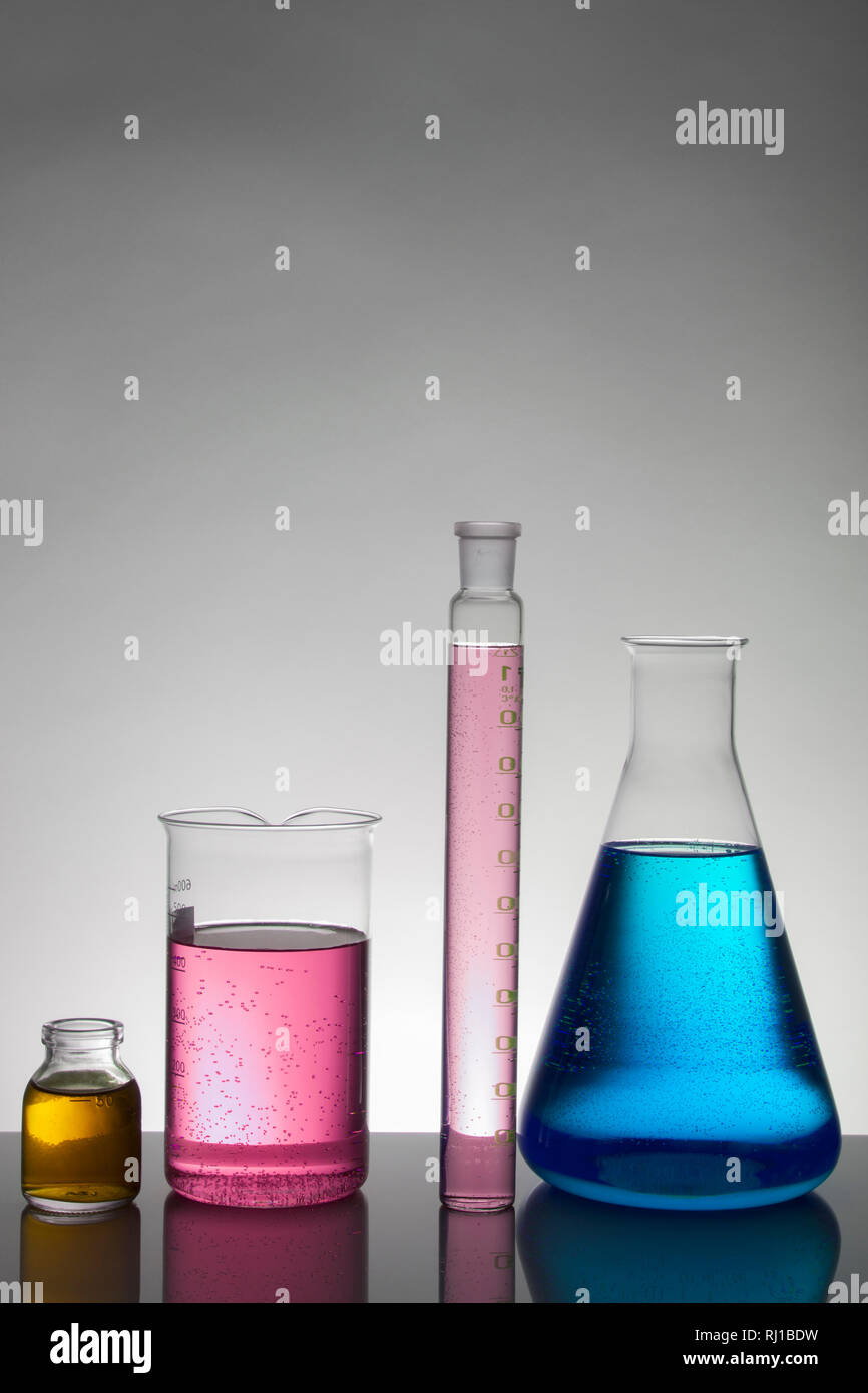 Liquid in laboratory bottles. Scientific biochemical laboratory ...