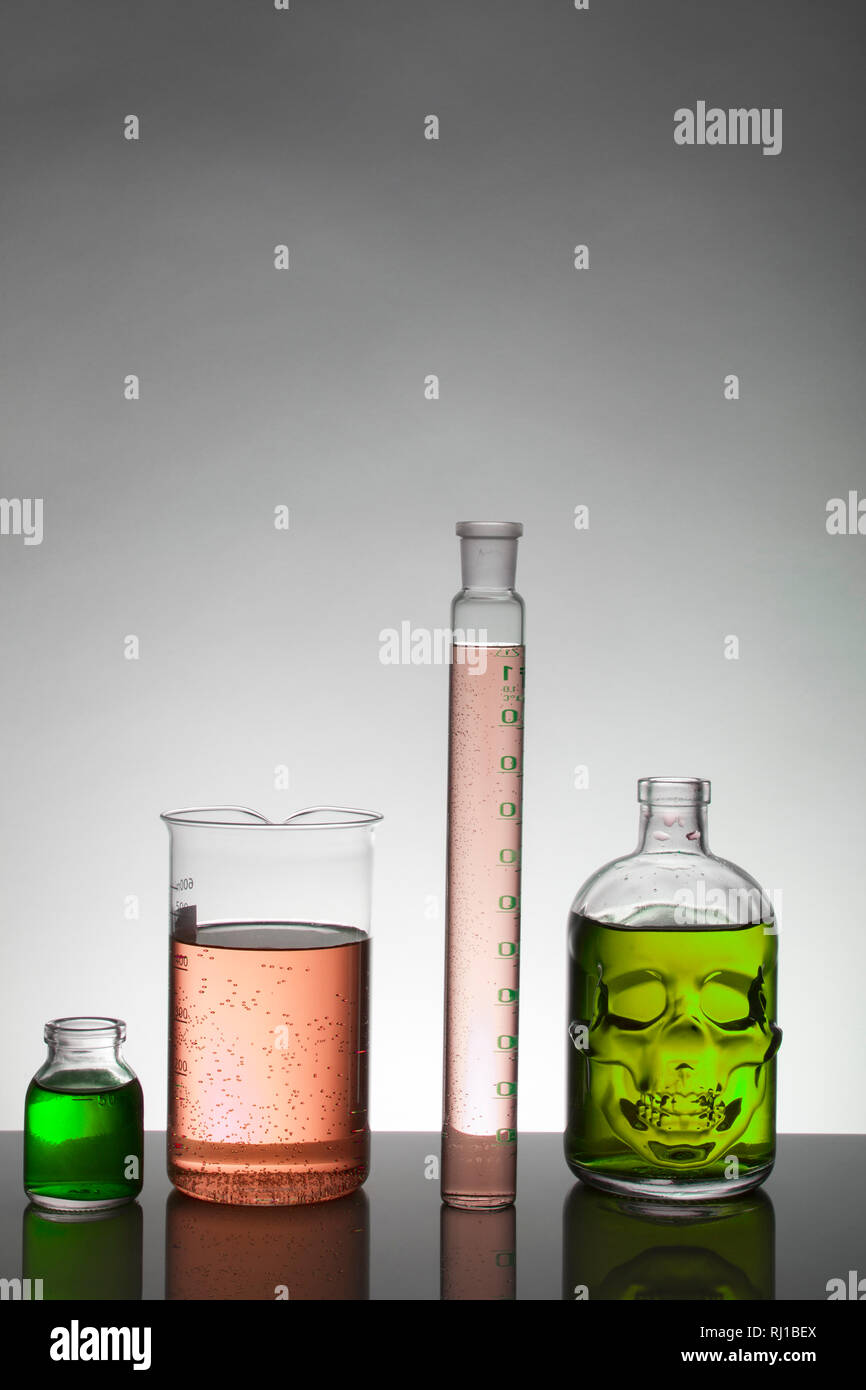 Liquid in laboratory bottles. Scientific biochemical laboratory ...
