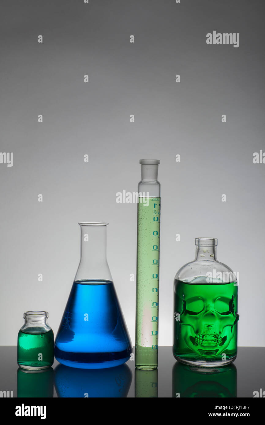 Liquid in laboratory bottles. Scientific biochemical laboratory ...