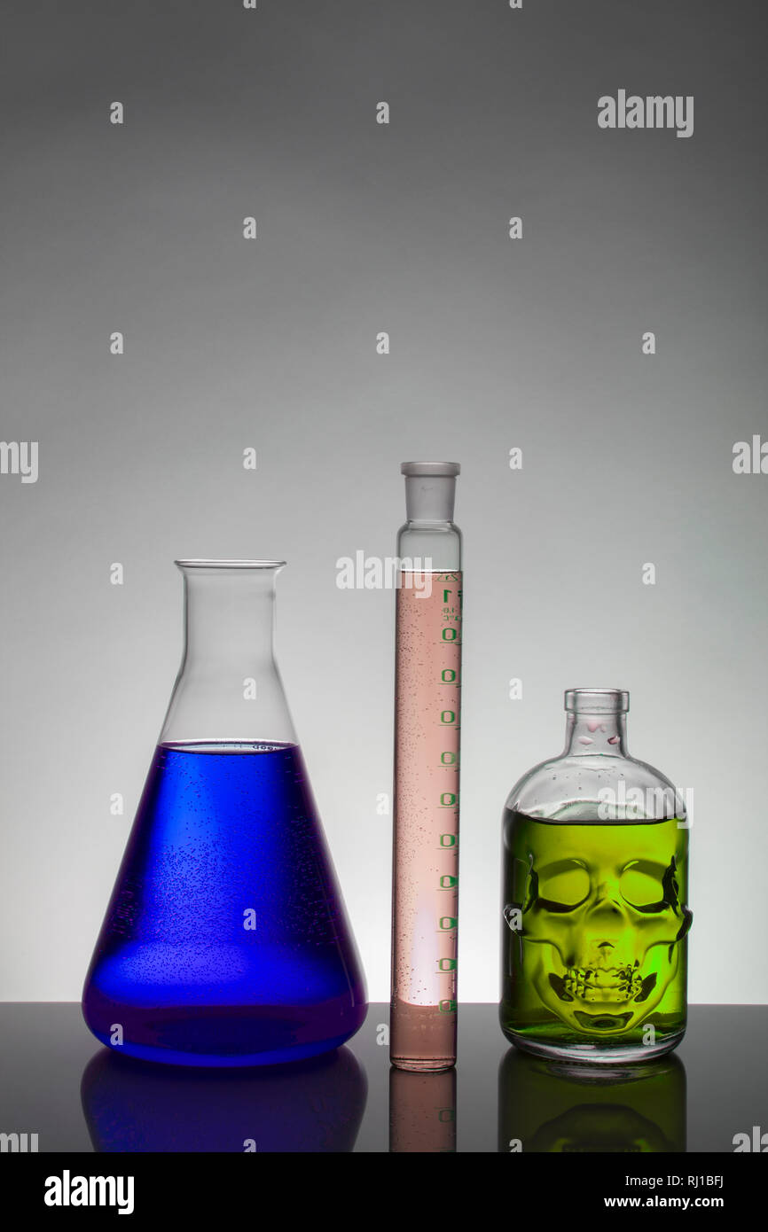 Liquid in laboratory bottles. Scientific biochemical laboratory ...