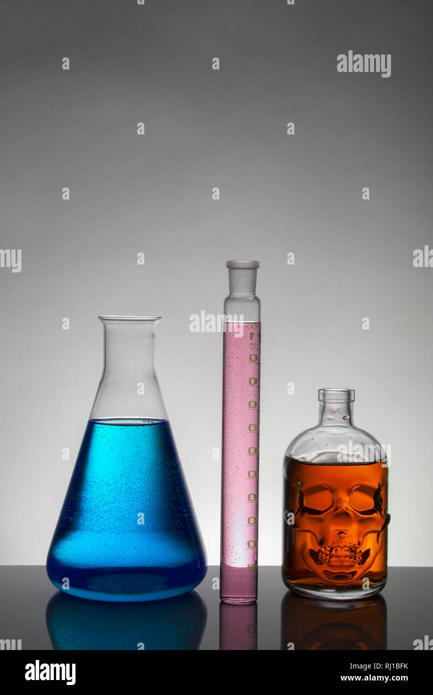 Liquid in laboratory bottles. Scientific biochemical laboratory ...
