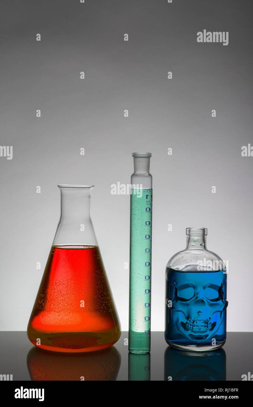 Liquid in laboratory bottles. Scientific biochemical laboratory ...