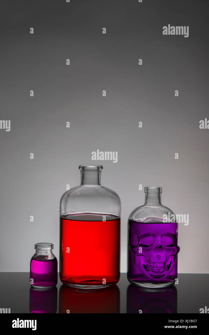 Liquid in laboratory bottles. Scientific biochemical laboratory ...