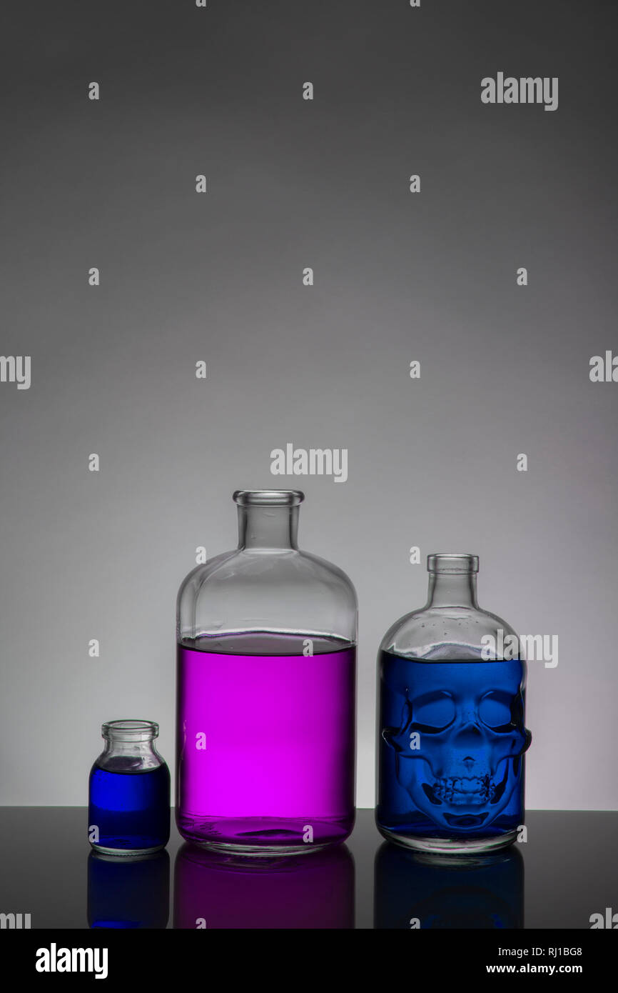 Liquid in laboratory bottles. Scientific biochemical laboratory ...