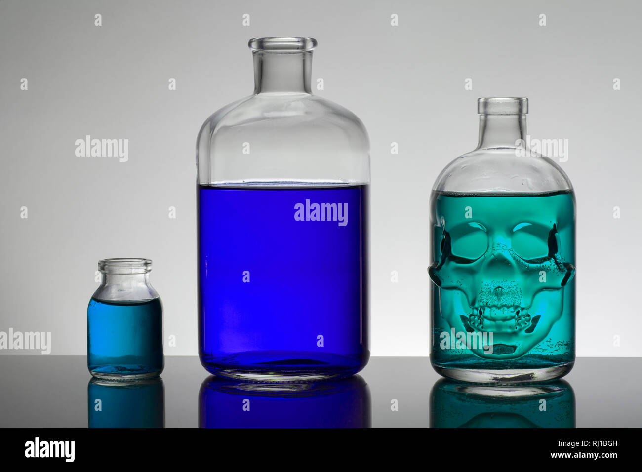 Liquid in laboratory bottles. Scientific biochemical laboratory ...