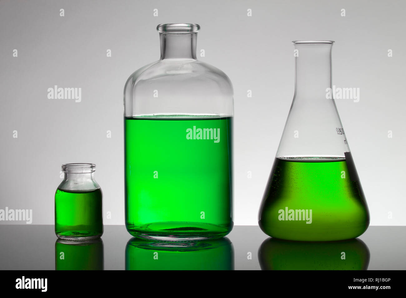 Liquid in laboratory bottles. Scientific biochemical laboratory ...