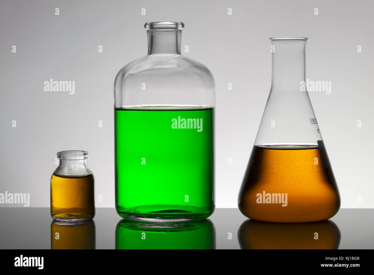 Liquid in laboratory bottles. Scientific biochemical laboratory ...