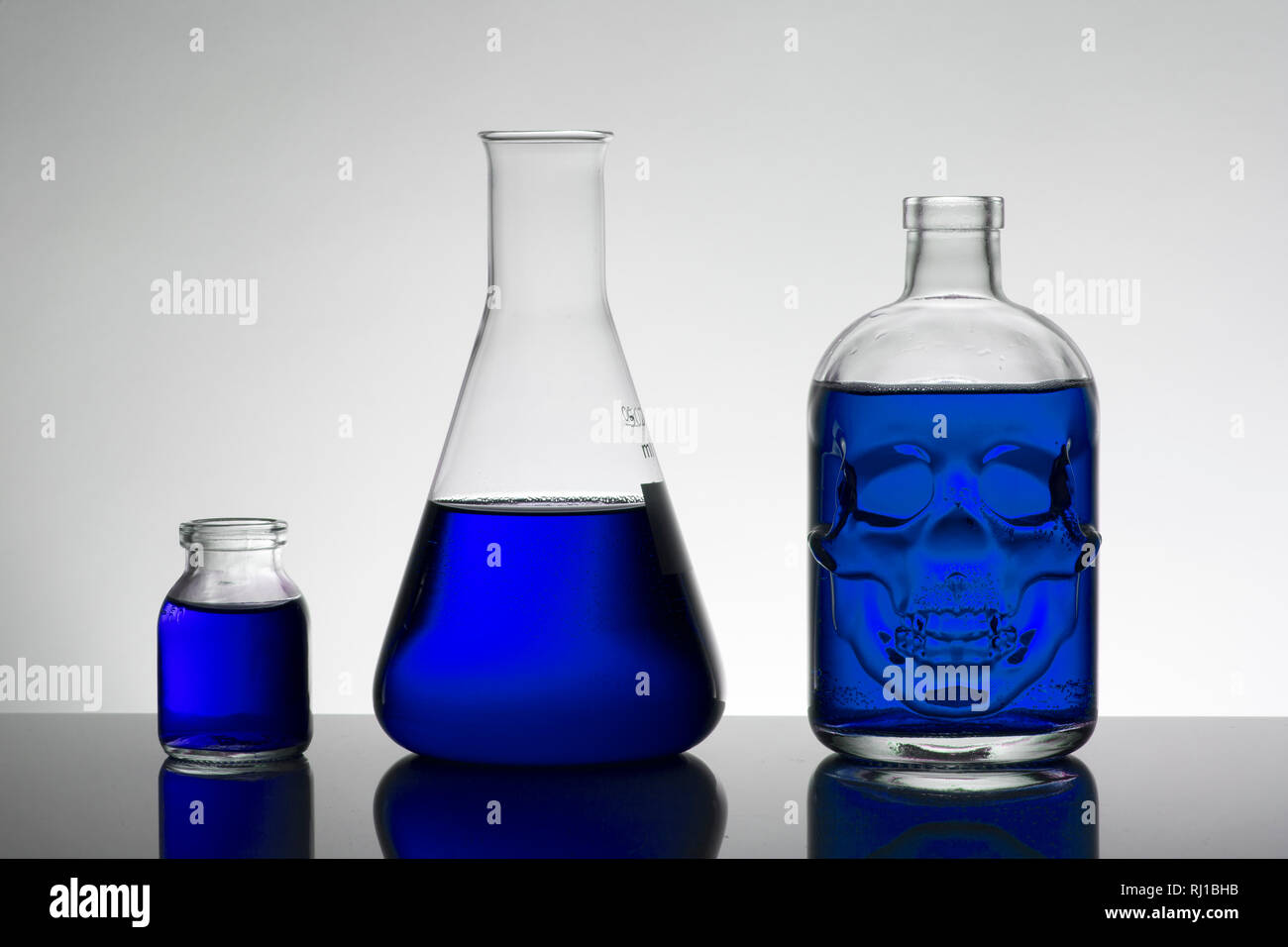 Liquid in laboratory bottles. Scientific biochemical laboratory ...