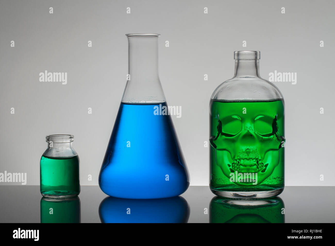 Liquid in laboratory bottles. Scientific biochemical laboratory ...
