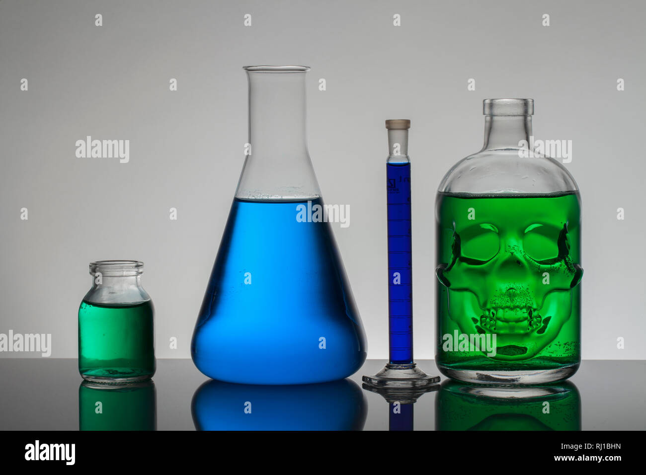 Liquid in laboratory bottles. Scientific biochemical laboratory ...