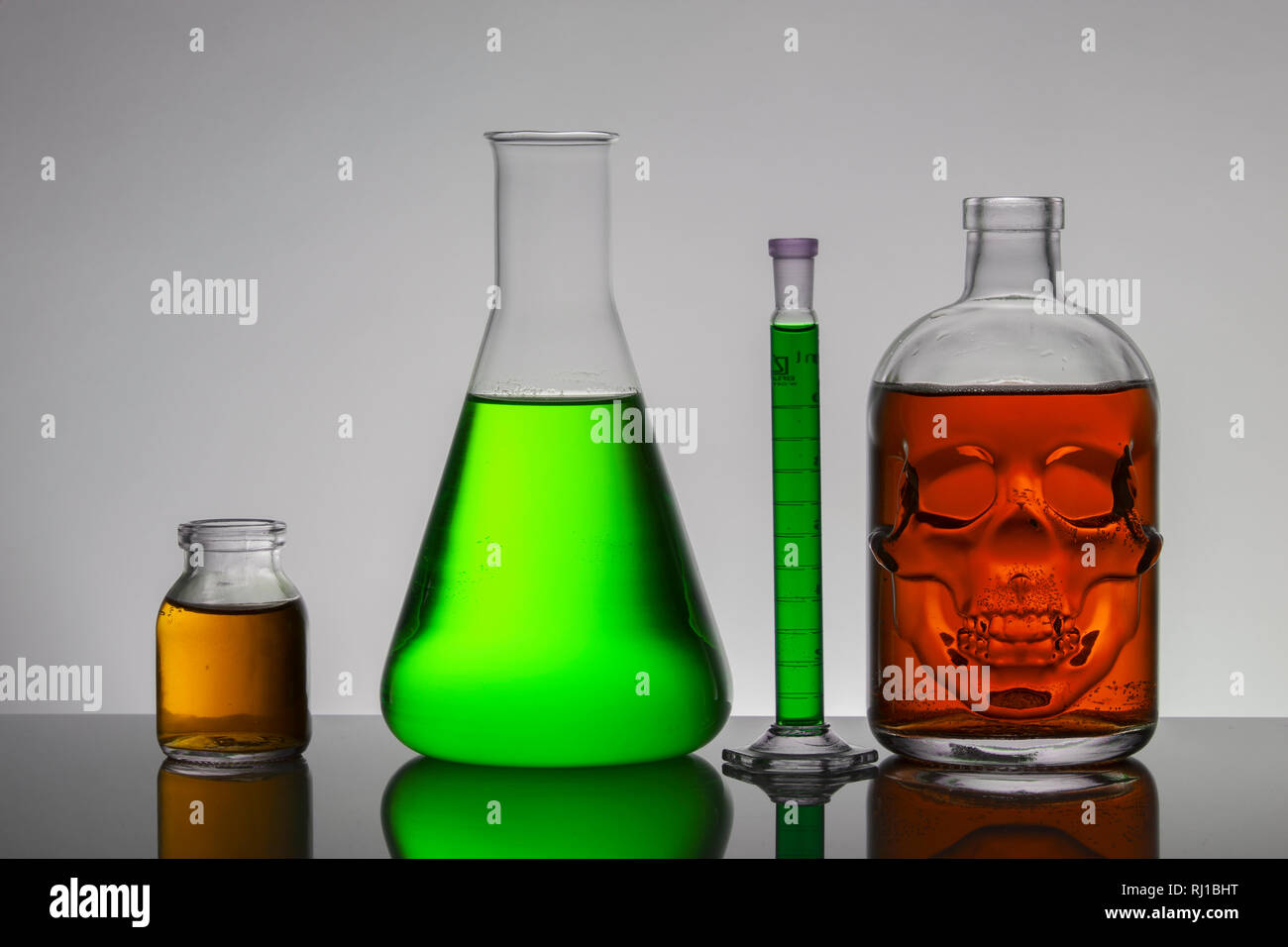 Liquid in laboratory bottles. Scientific biochemical laboratory ...