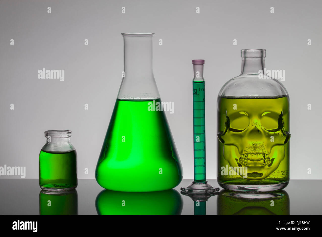 Liquid in laboratory bottles. Scientific biochemical laboratory ...