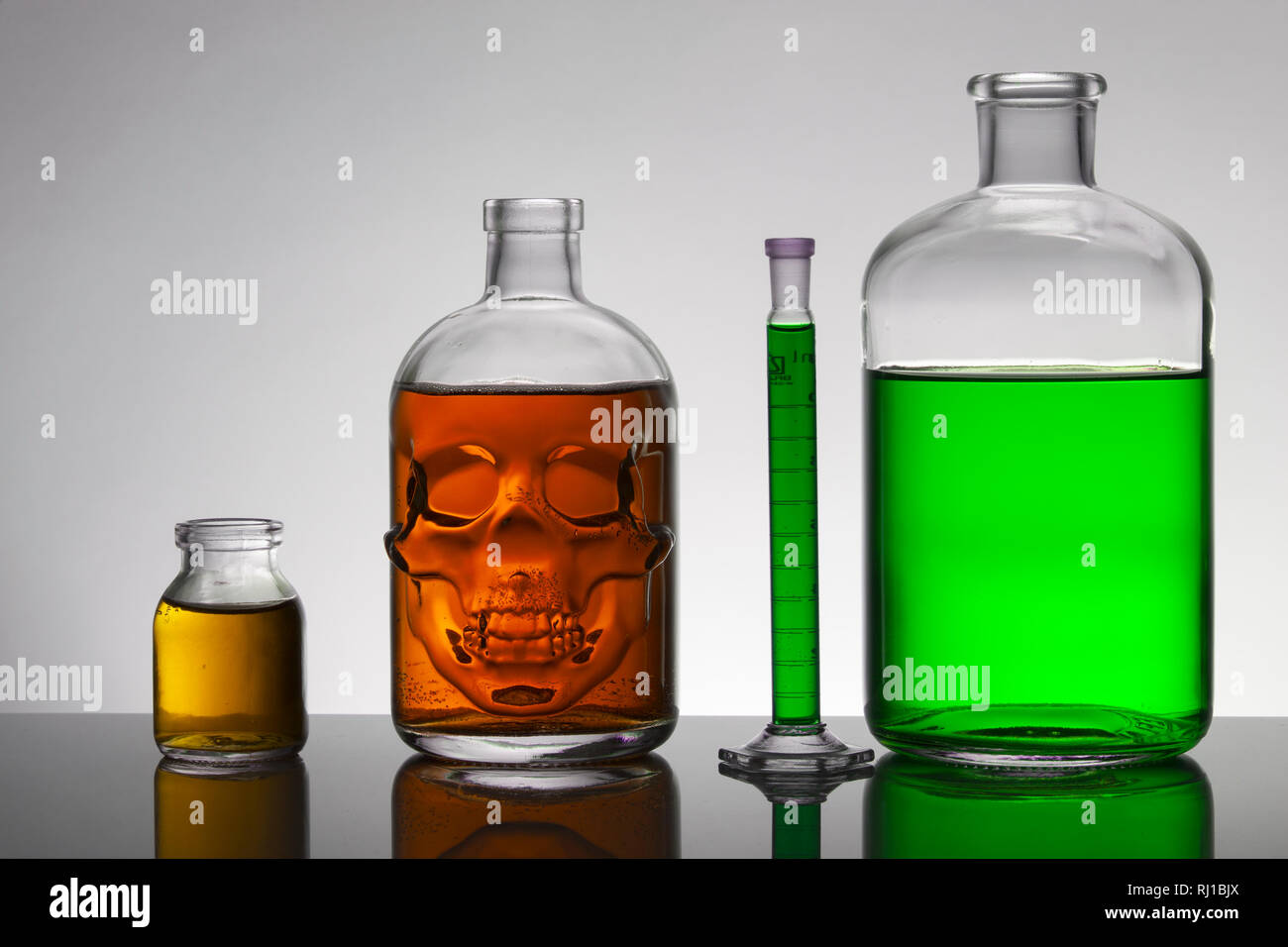 Liquid in laboratory bottles. Scientific biochemical laboratory ...