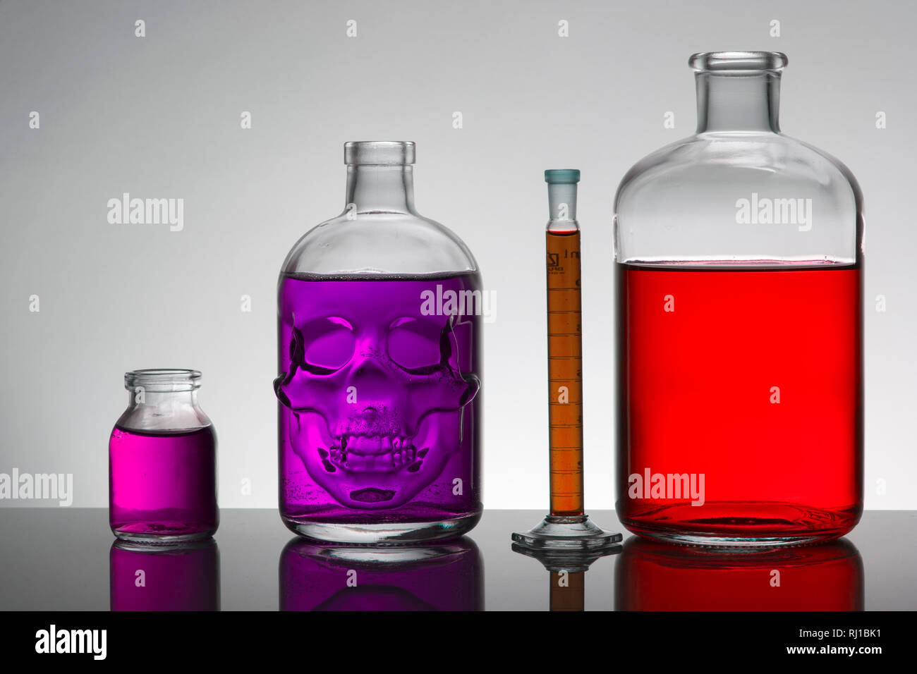 Liquid in laboratory bottles. Scientific biochemical laboratory ...