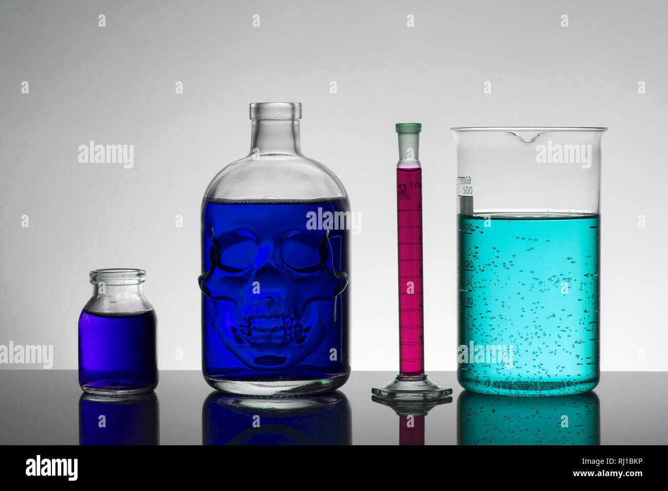 Liquid in laboratory bottles. Scientific biochemical laboratory ...