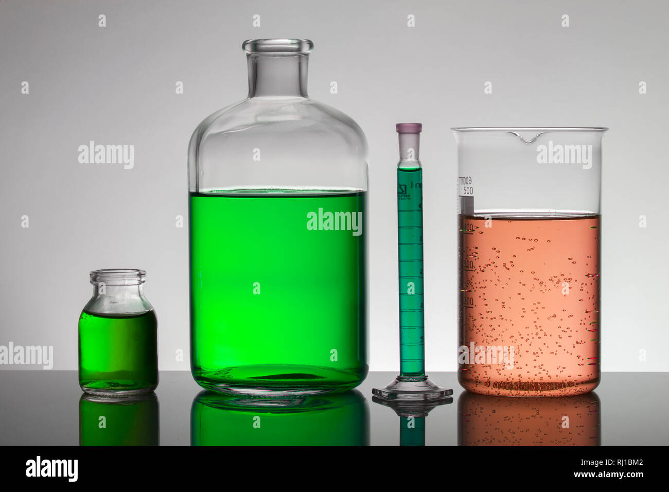 Liquid in laboratory bottles. Scientific biochemical laboratory ...