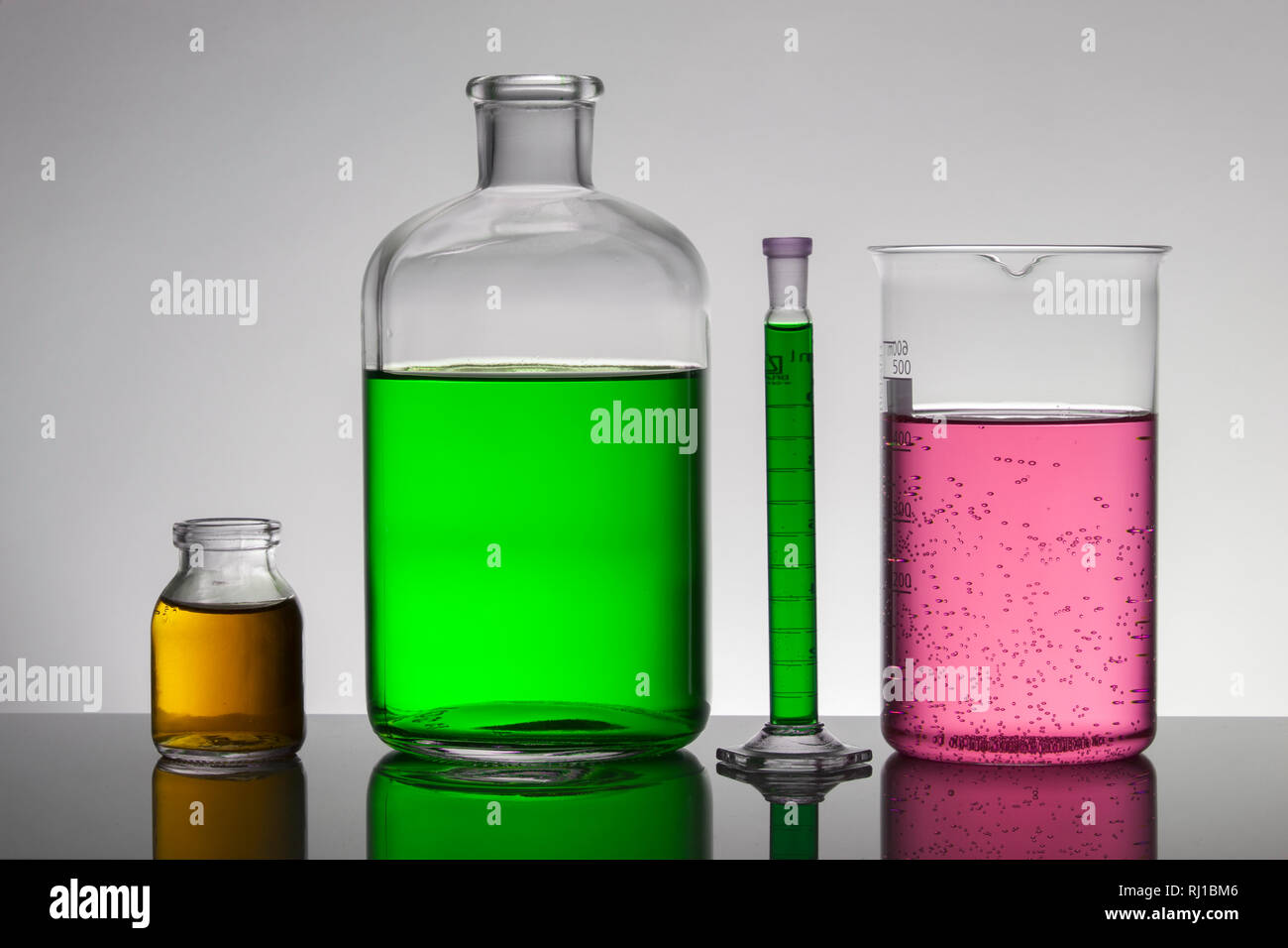 Liquid in laboratory bottles. Scientific biochemical laboratory ...