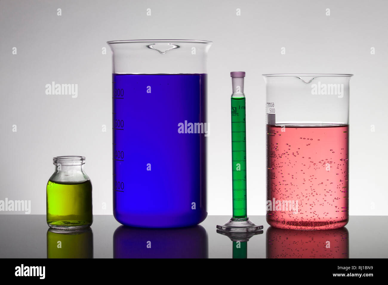 Liquid in laboratory bottles. Scientific biochemical laboratory ...