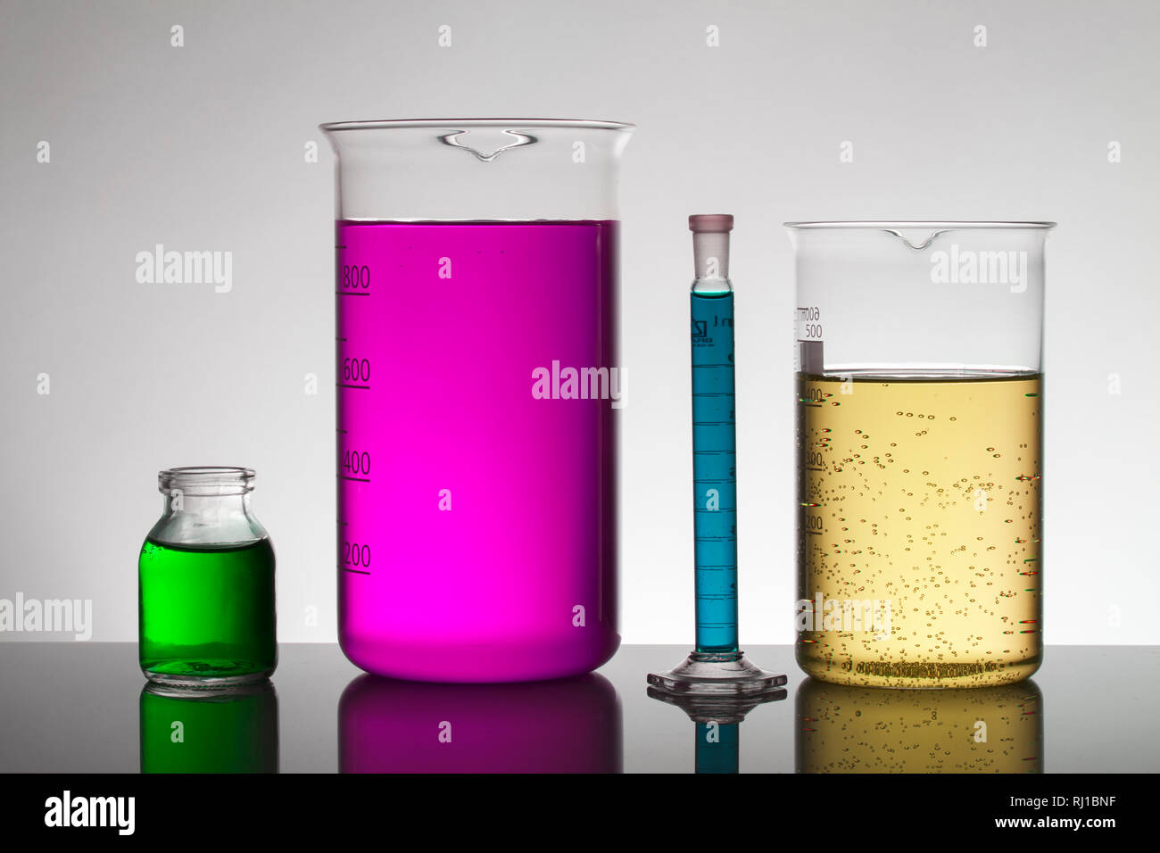 Liquid in laboratory bottles. Scientific biochemical laboratory ...