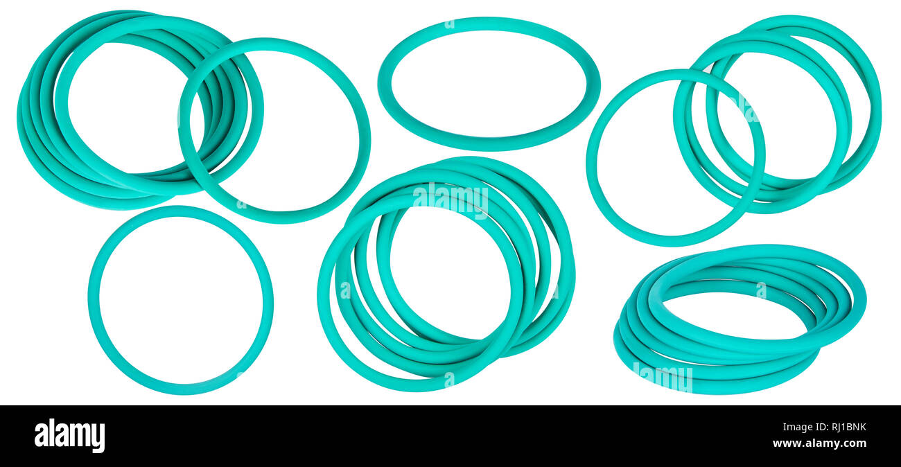 Green hydraulic and pneumatic o-ring seals of different sizes scattered ...