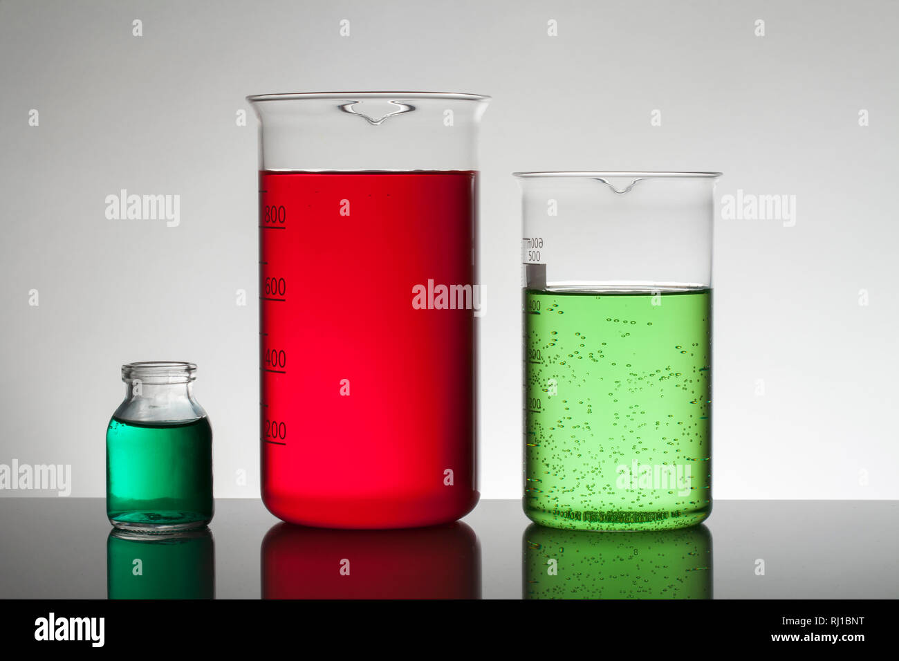 Liquid in laboratory bottles. Scientific biochemical laboratory ...
