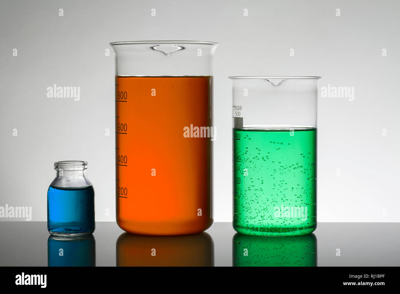 Liquid in laboratory bottles. Scientific biochemical laboratory ...