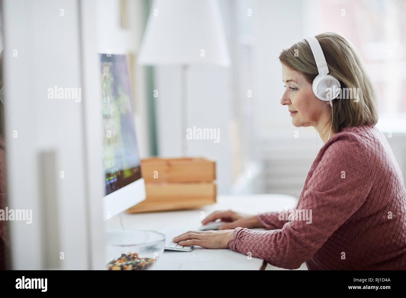 Adult Woman Using Computer Stock Photo - Alamy