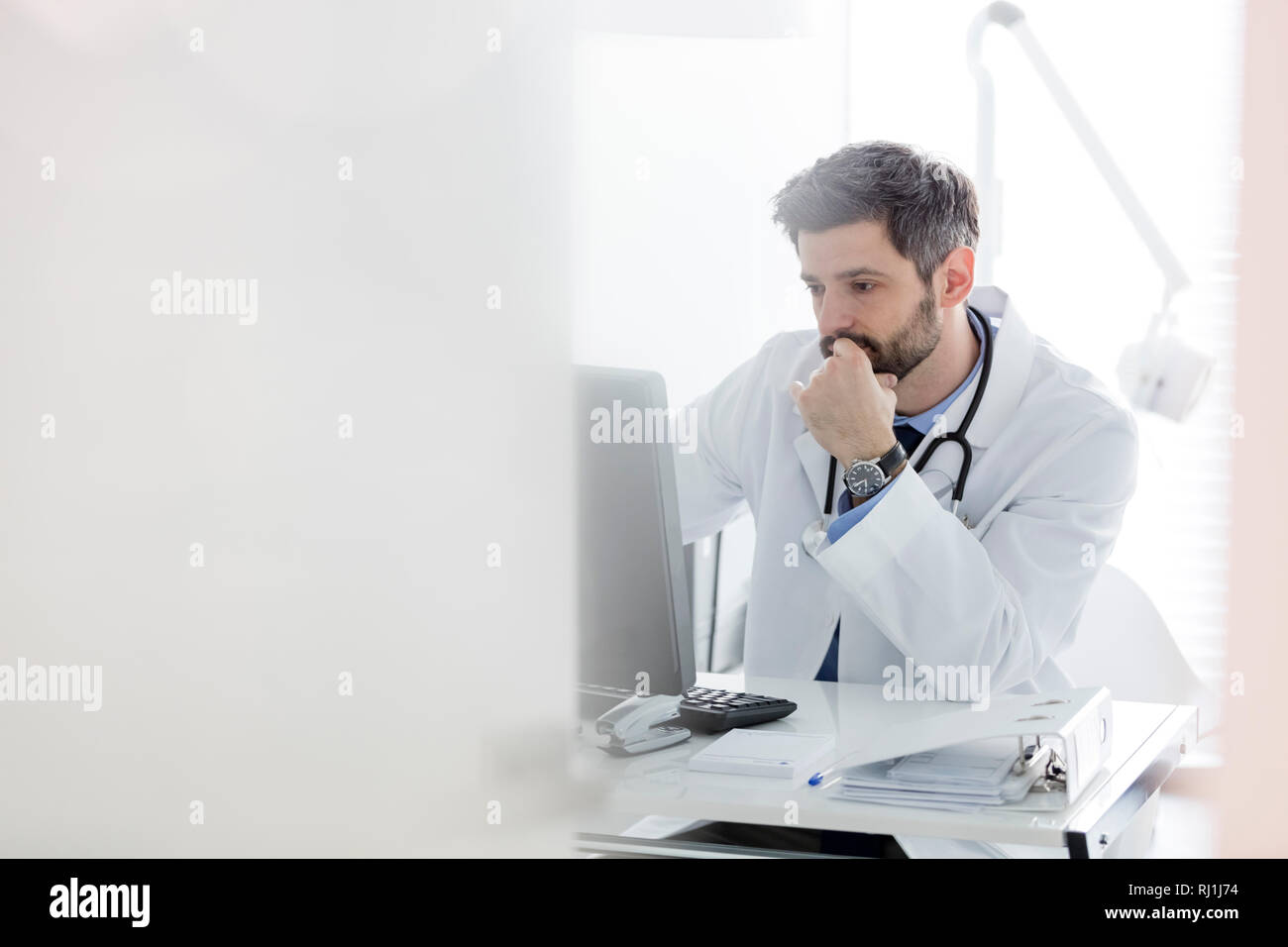 Doctor working desk hi-res stock photography and images - Alamy