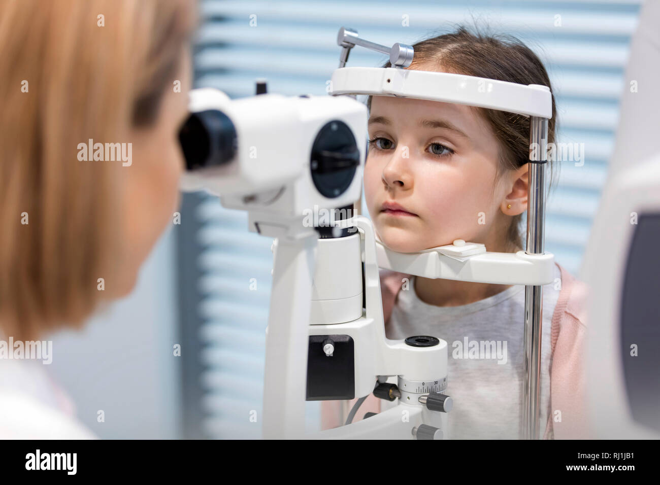 Closeup of doctor testing girl at hospital Stock Photo - Alamy
